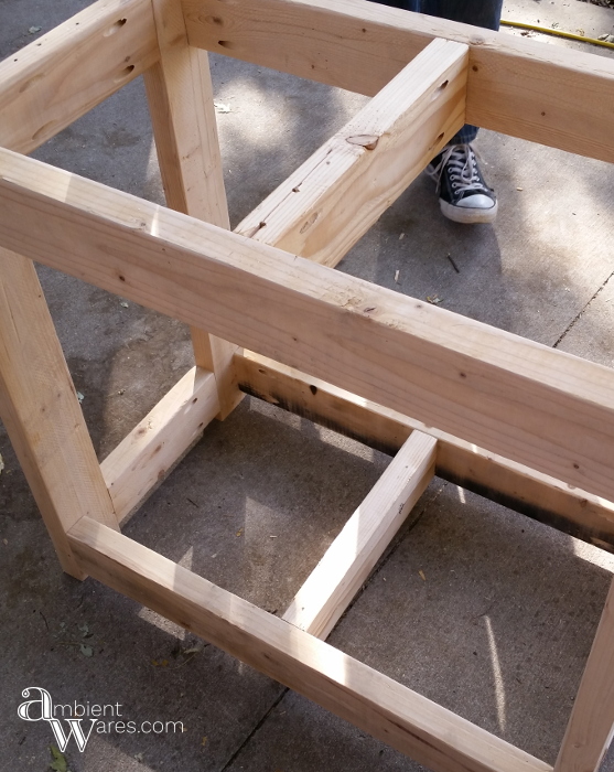 DIY Shelving Unit using 2x4s and Pallet Wood