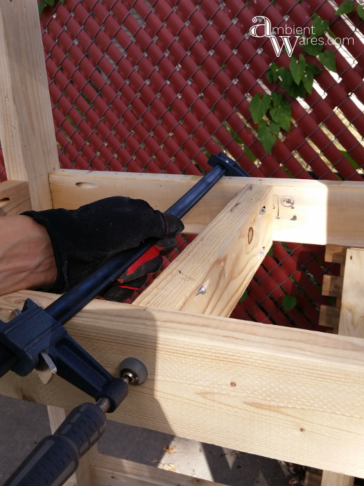 DIY Shelving Unit using 2x4s and Pallet Wood